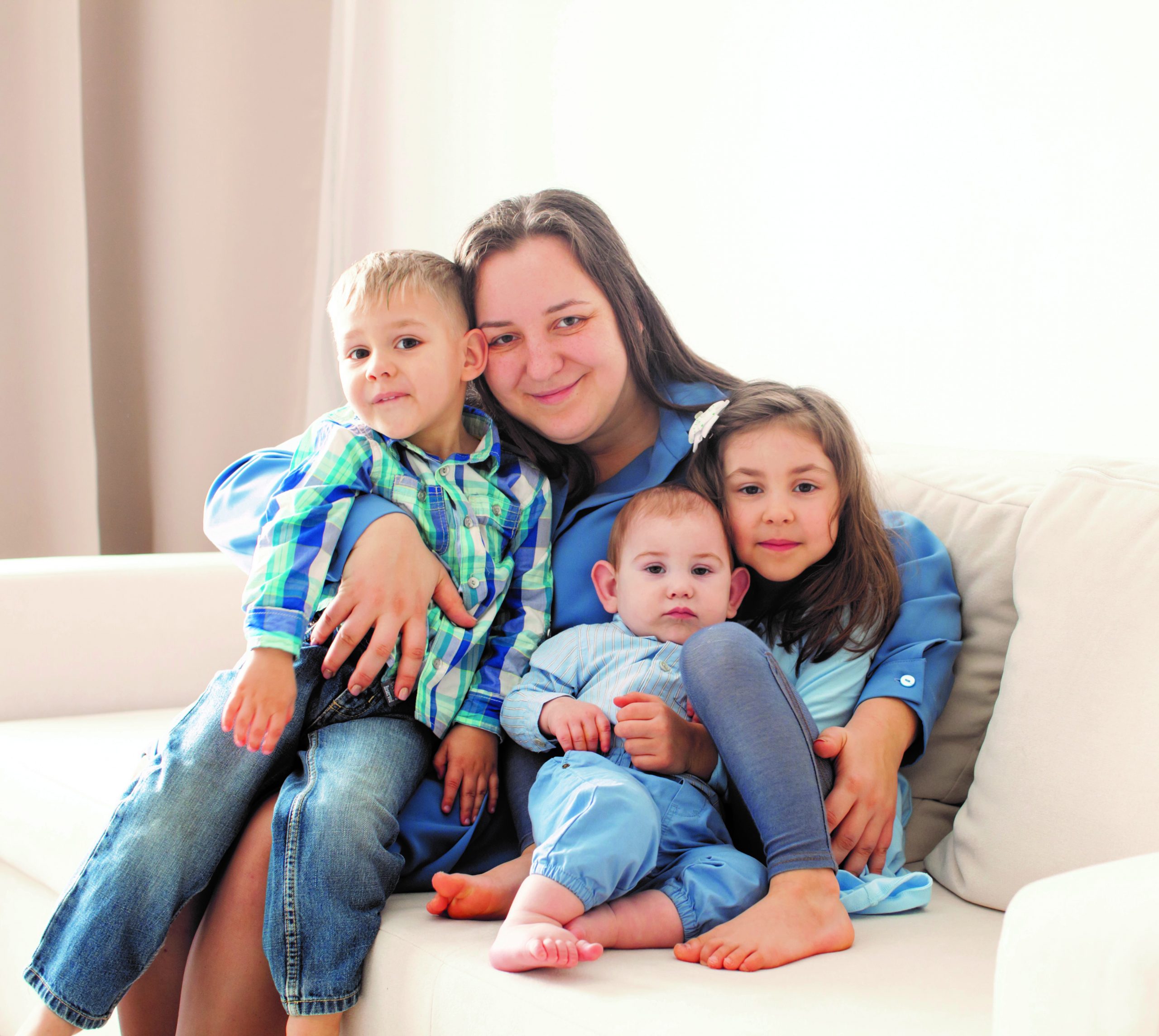 Mother and three children – Ohio Access to Justice Foundation